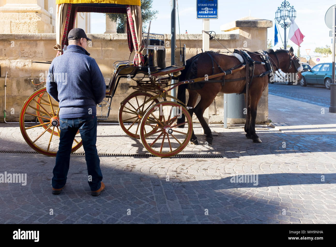 Horse drawn carriages offer visitors a guided tour of the sights in ...