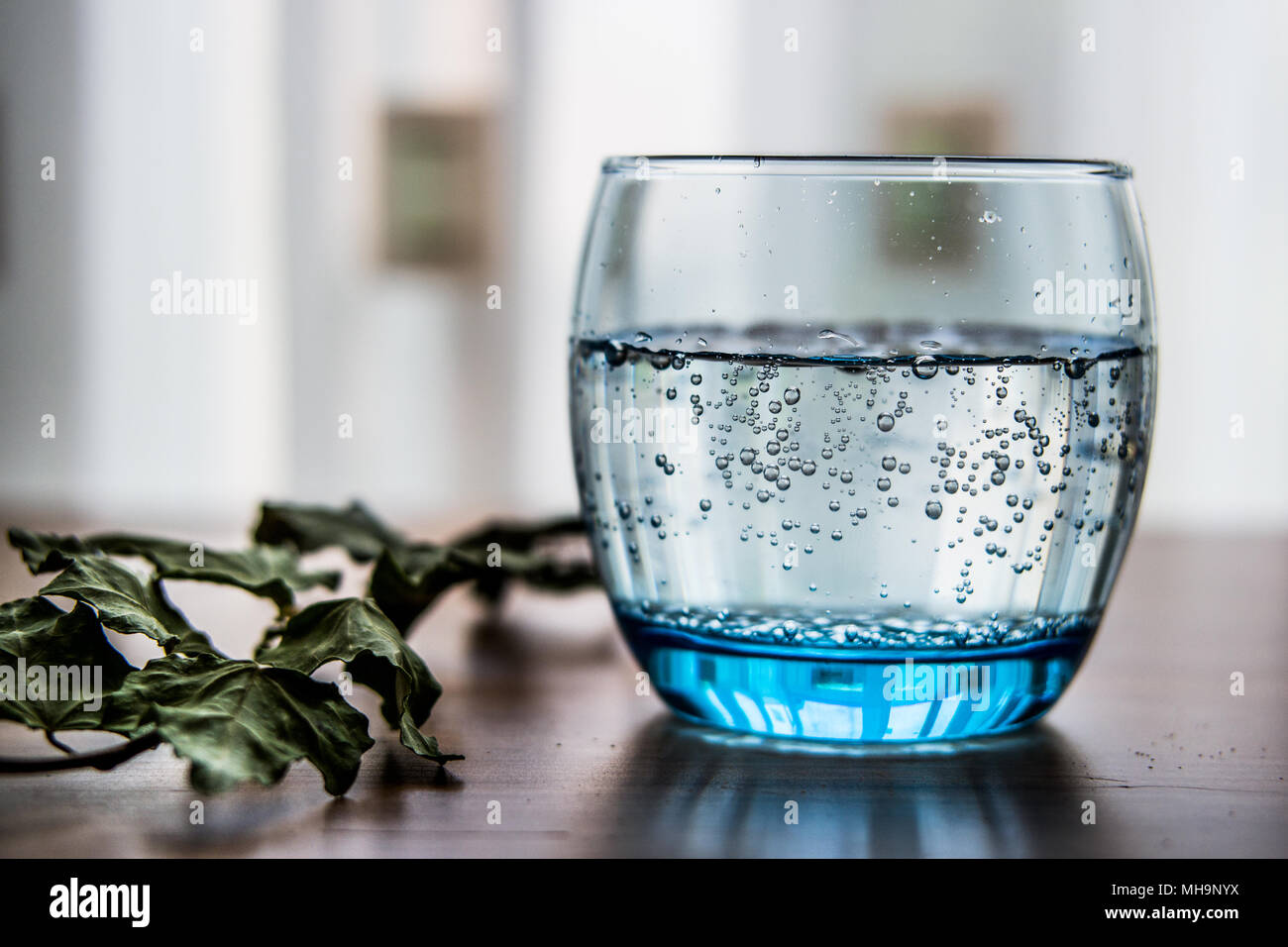 Pouring Mineral Water into the Glass Stock Photo - Alamy