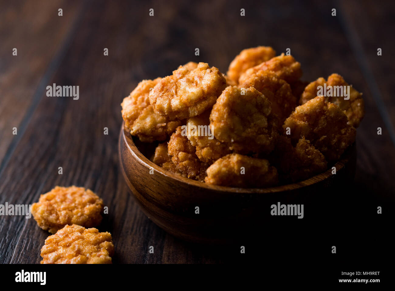 Thai Chilli Spicy Rice Crackers in wooden bowl. Organic Snacks Stock ...