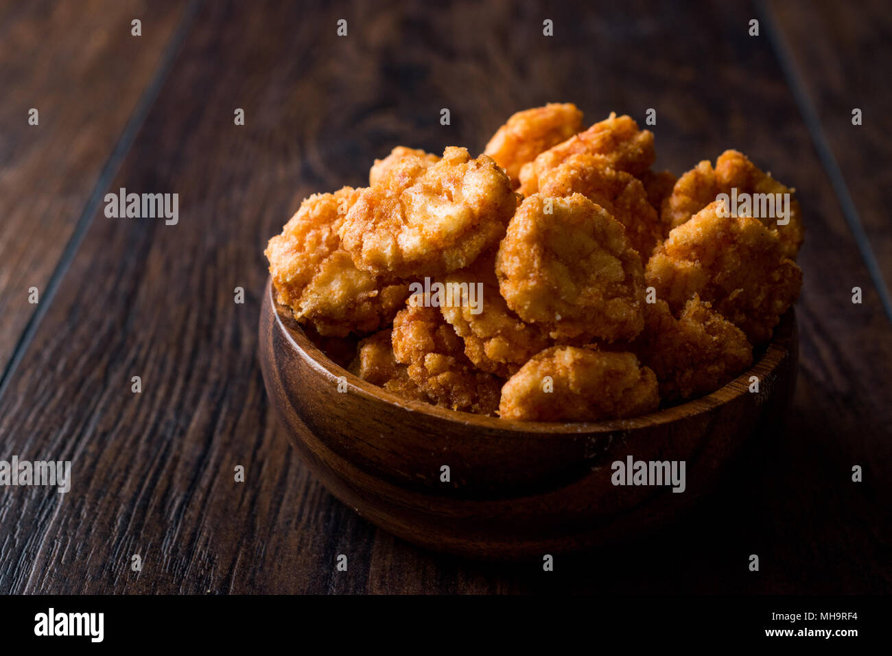 Thai Chilli Spicy Rice Crackers in wooden bowl. Organic Snacks Stock ...
