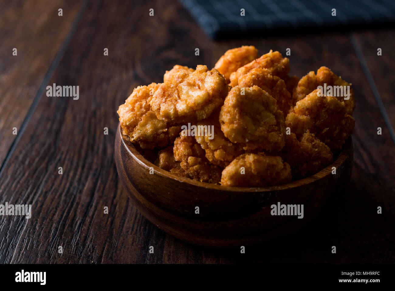 Thai Chilli Spicy Rice Crackers in wooden bowl. Organic Snacks Stock ...