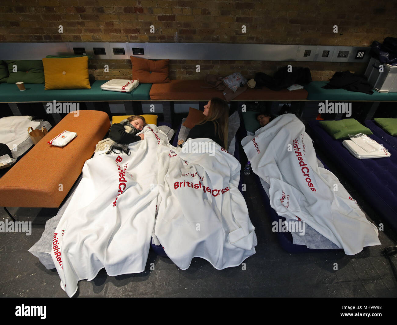 Stranded commuters, played by actors, during an emergency simulation ...