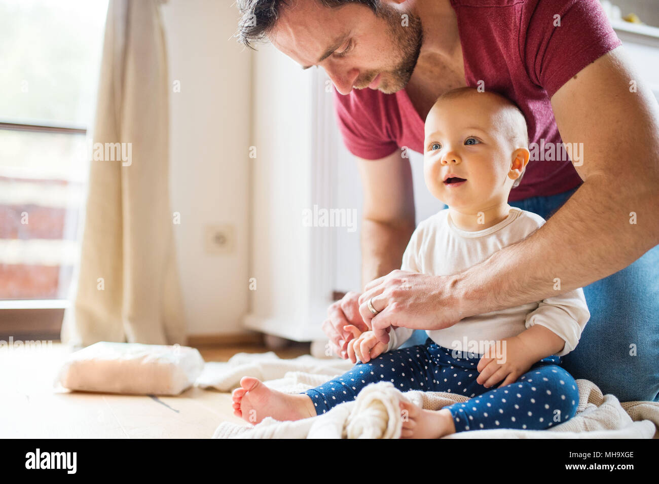 Father Looking After Child High Resolution Stock Photography and Images ...