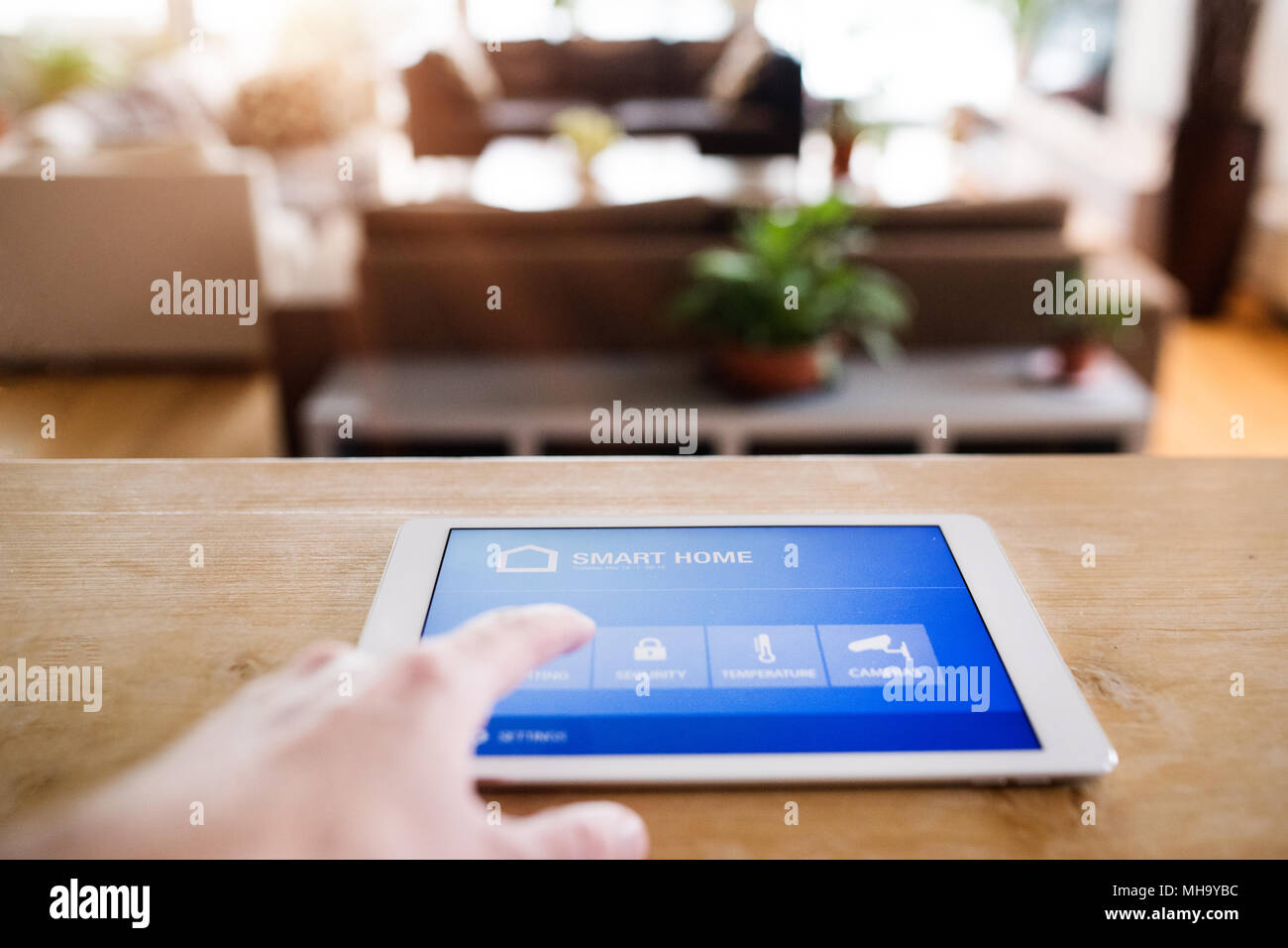 A tablet with smart home screen Stock Photo - Alamy