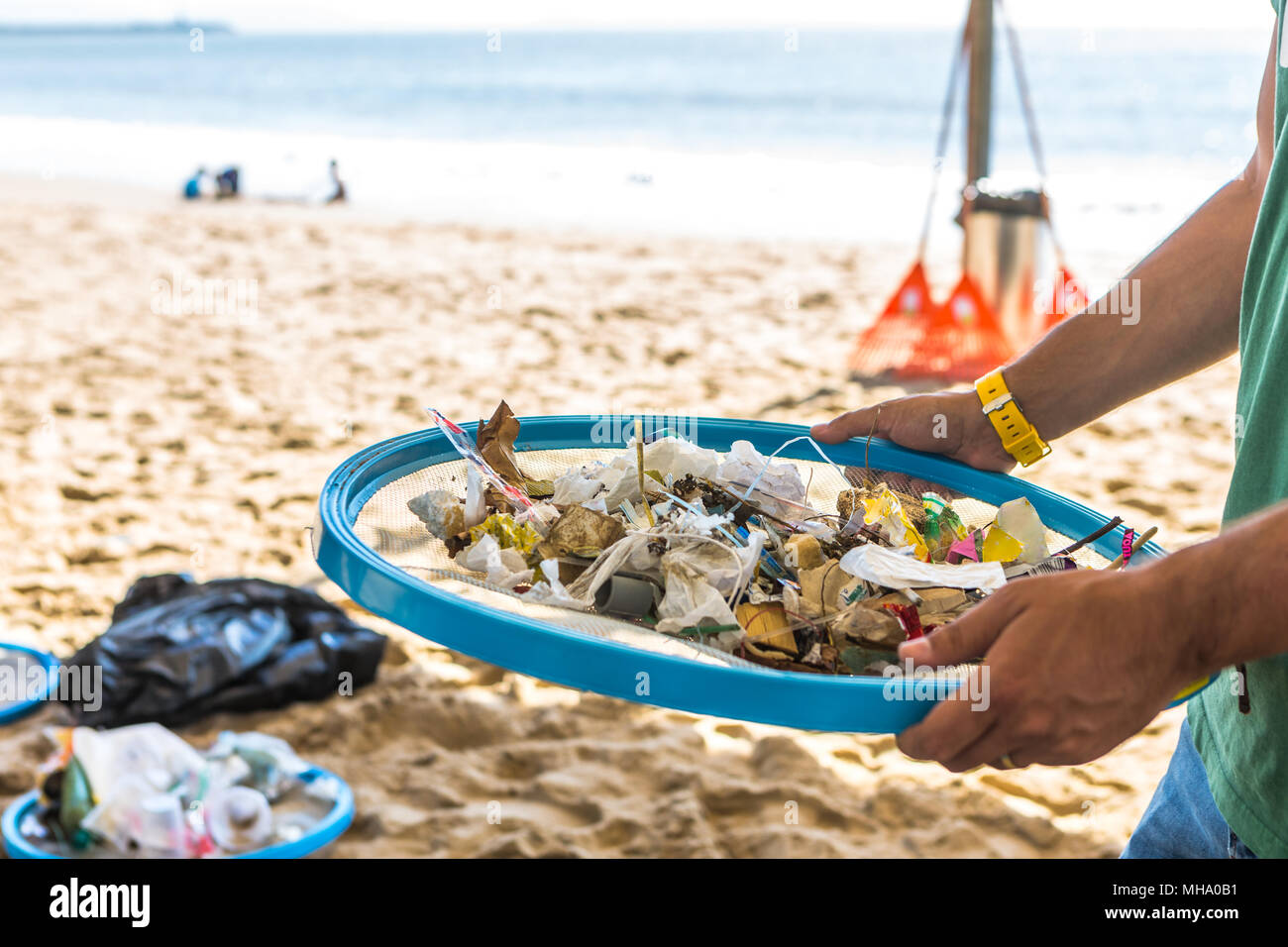 Beach Cleaning. Cleaning dirty beaches by the action of man ...
