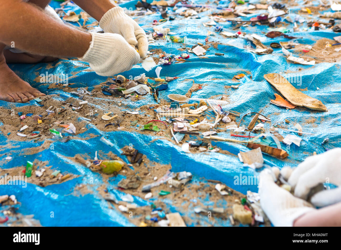 Cleaning beaches hi-res stock photography and images - Alamy