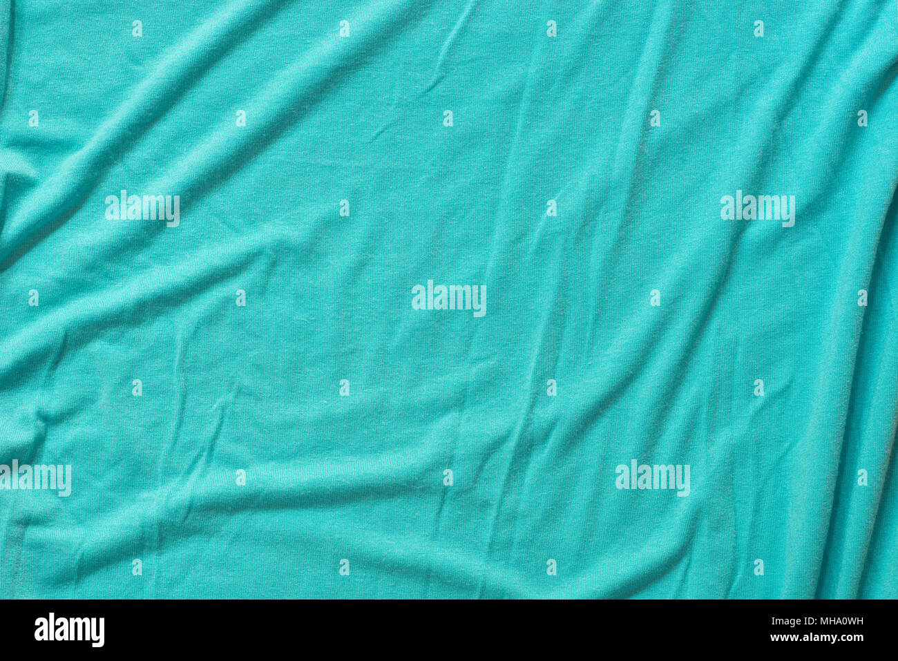 turquoise color creased cotton fabric background texture Stock Photo ...