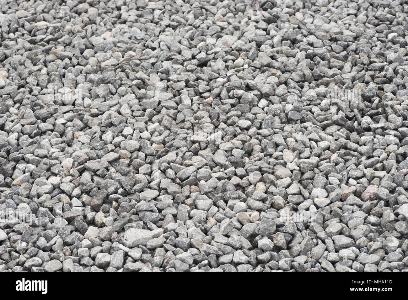 gray gravel stones texture background selective focus Stock Photo - Alamy
