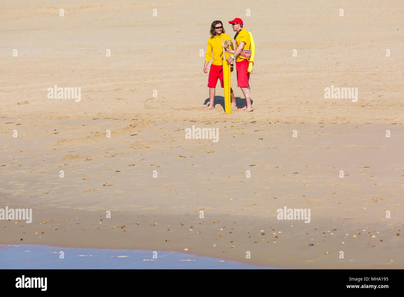 RNLI Lifeguards at Bournemouth beach, Dorset in April Stock Photo - Alamy