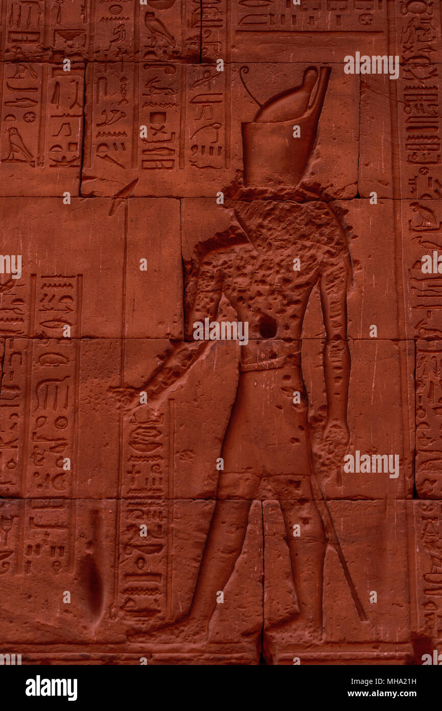Authentic Hieroglyphic illustration of the Egyptian god on the wall in ...