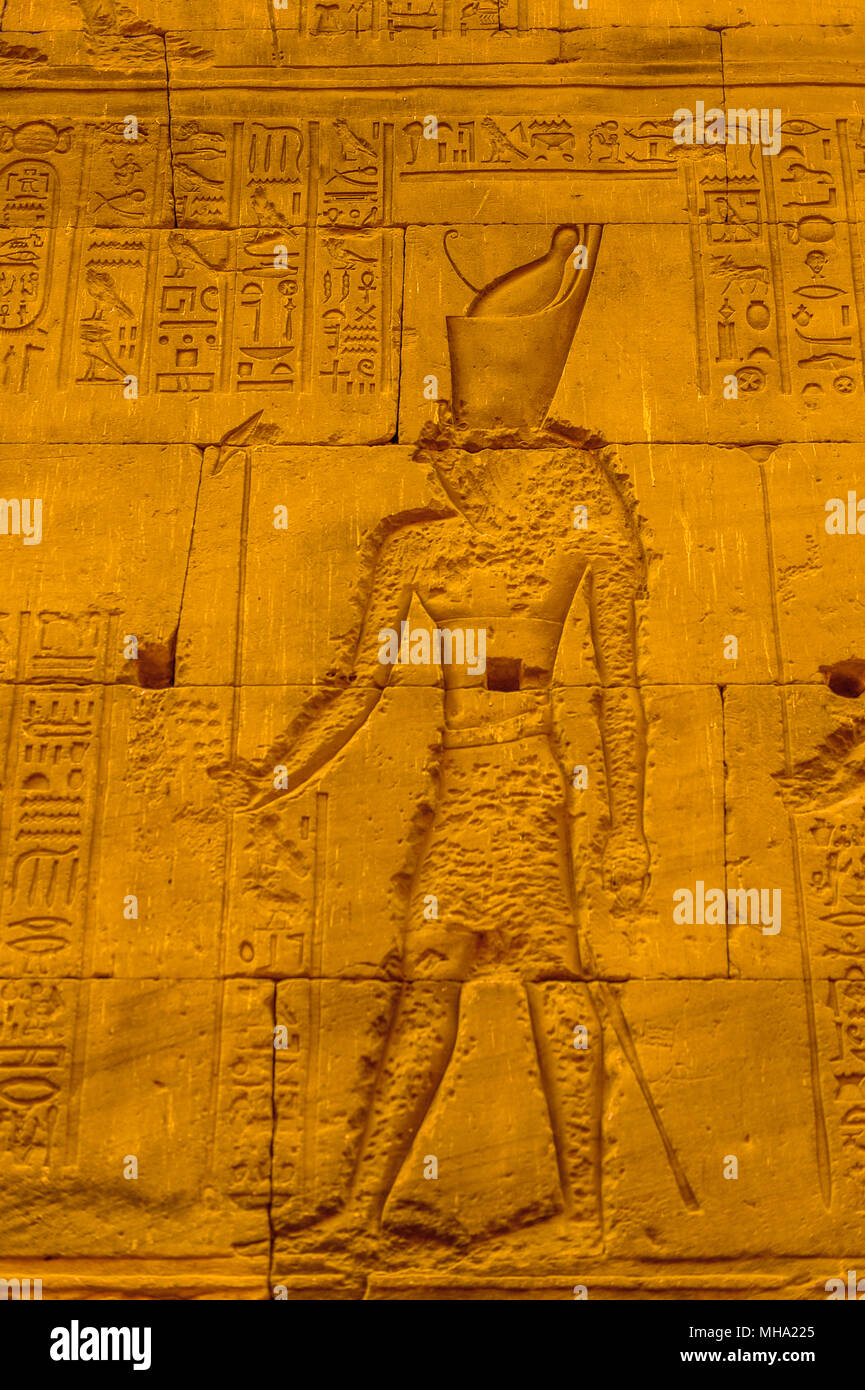 Authentic Hieroglyphic illustration of the Egyptian god on the wall in ...
