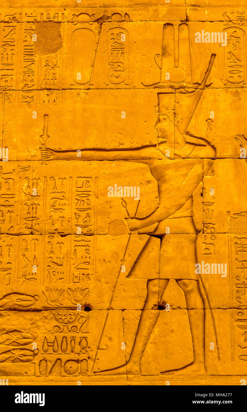 Authentic Hieroglyphic illustration of the Egyptian god on the wall in ...