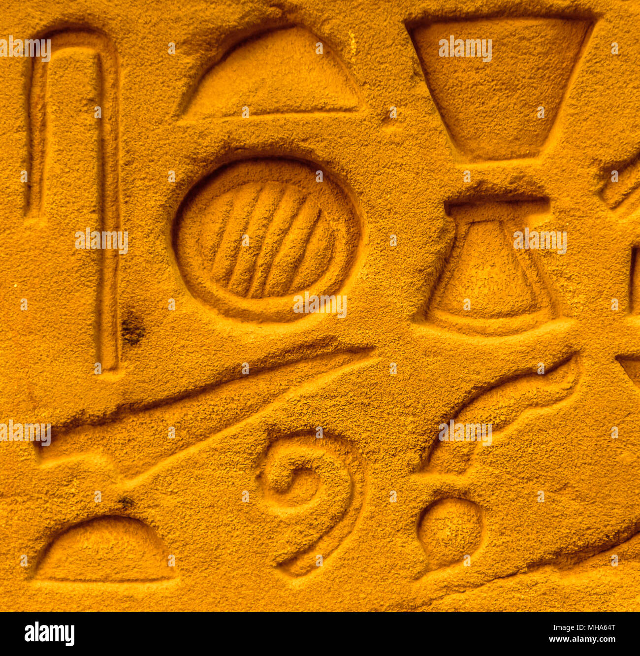 Egyptian hieroglyphs on the wall in a temple Stock Photo - Alamy