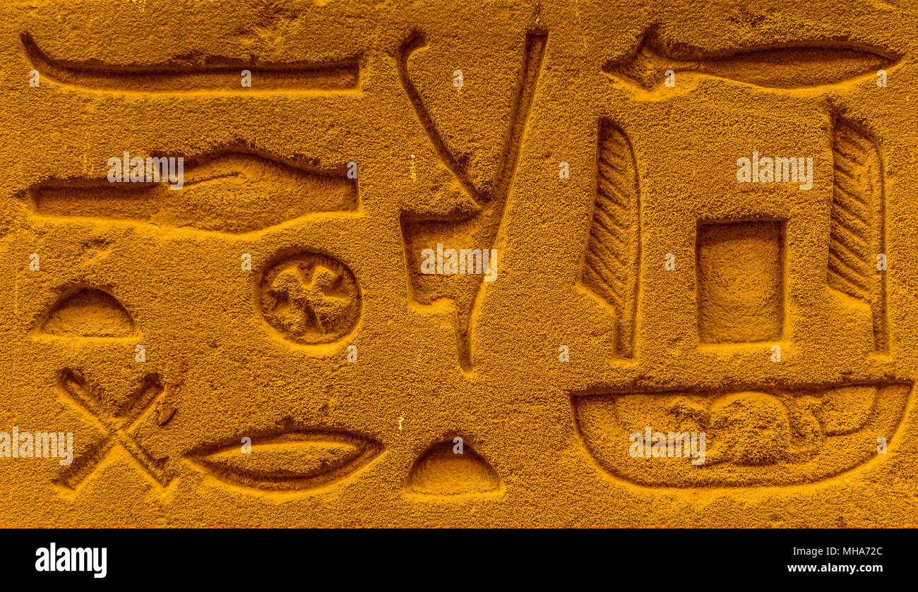 Egyptian hieroglyphs on the wall of the Horus temple in Egypt Stock ...