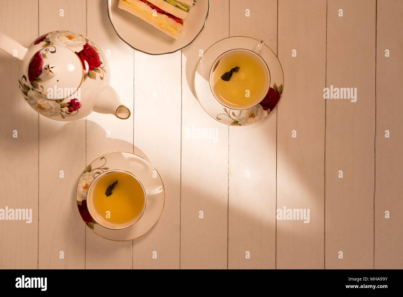 Afternoon tea table. Tea set with sweet cakes or cookies Stock Photo ...