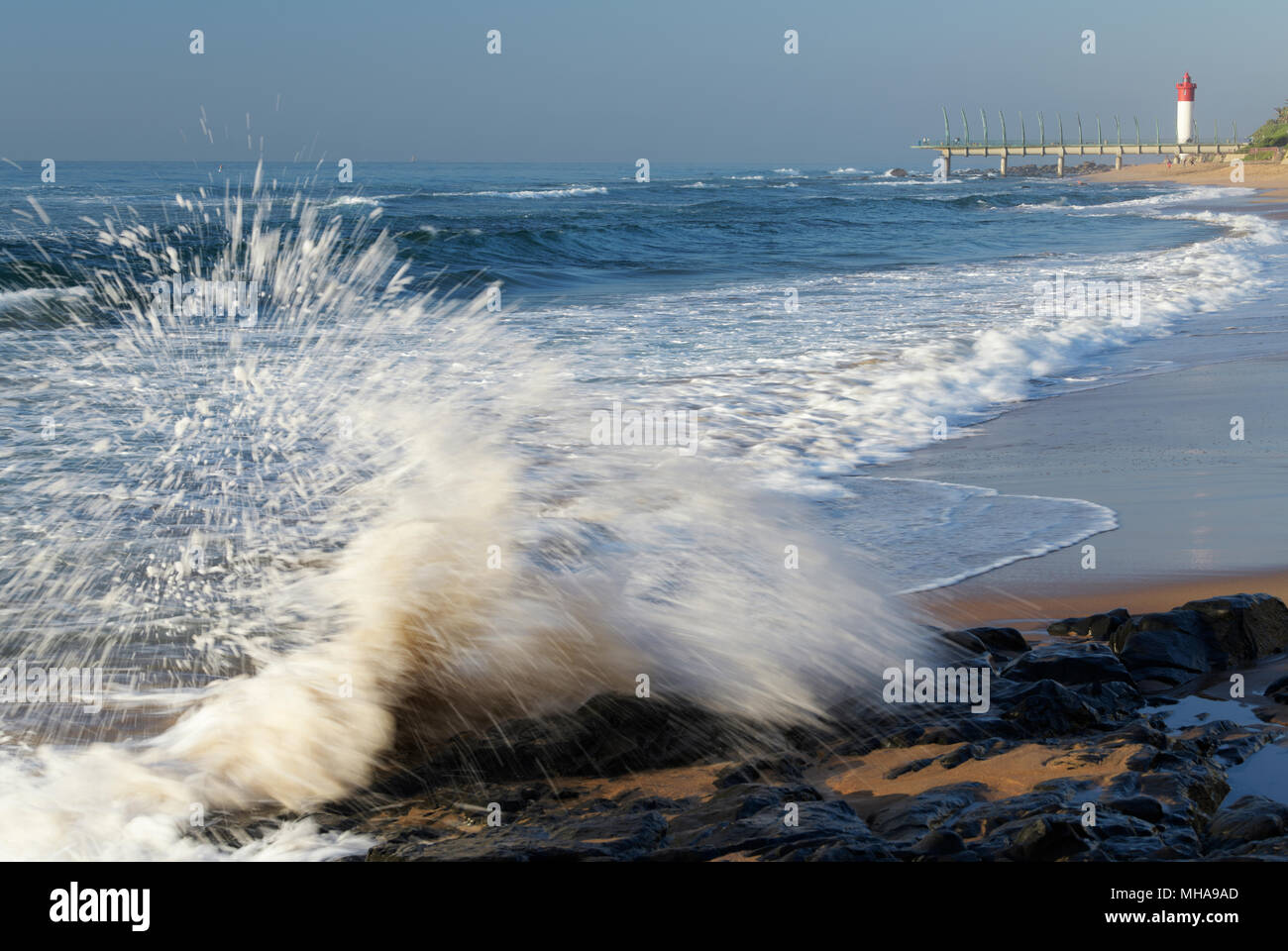 Durban, KwaZulu-Natal, South Africa, flying spray, wave hitting rock ...