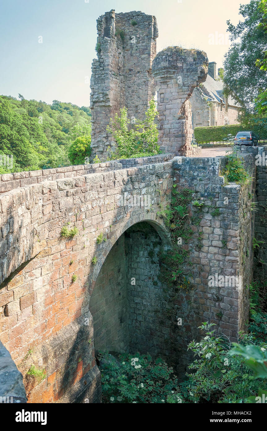 Heavily fortified castle ruins located on a dramatic promontory ...