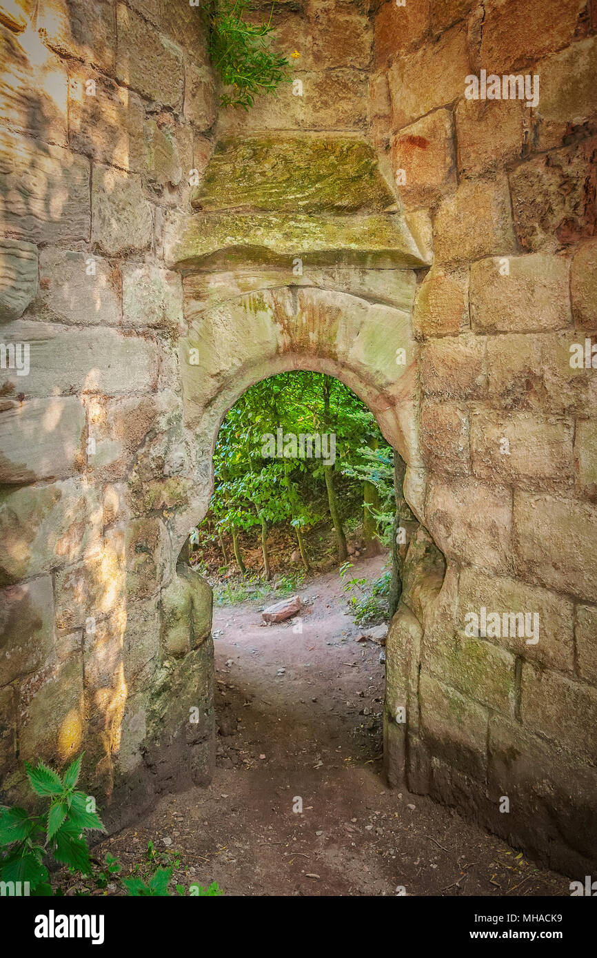 Heavily fortified castle ruins located on a dramatic promontory ...