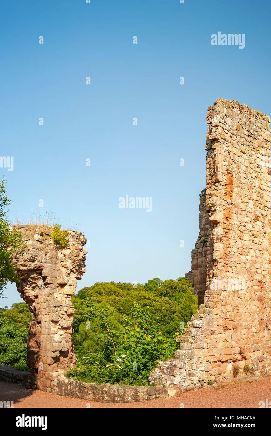 Heavily fortified castle ruins located on a dramatic promontory ...