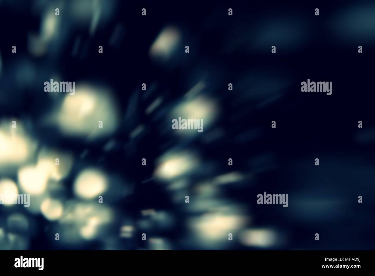 Flying drops of water, defocused rain drops in dark space Stock Photo ...