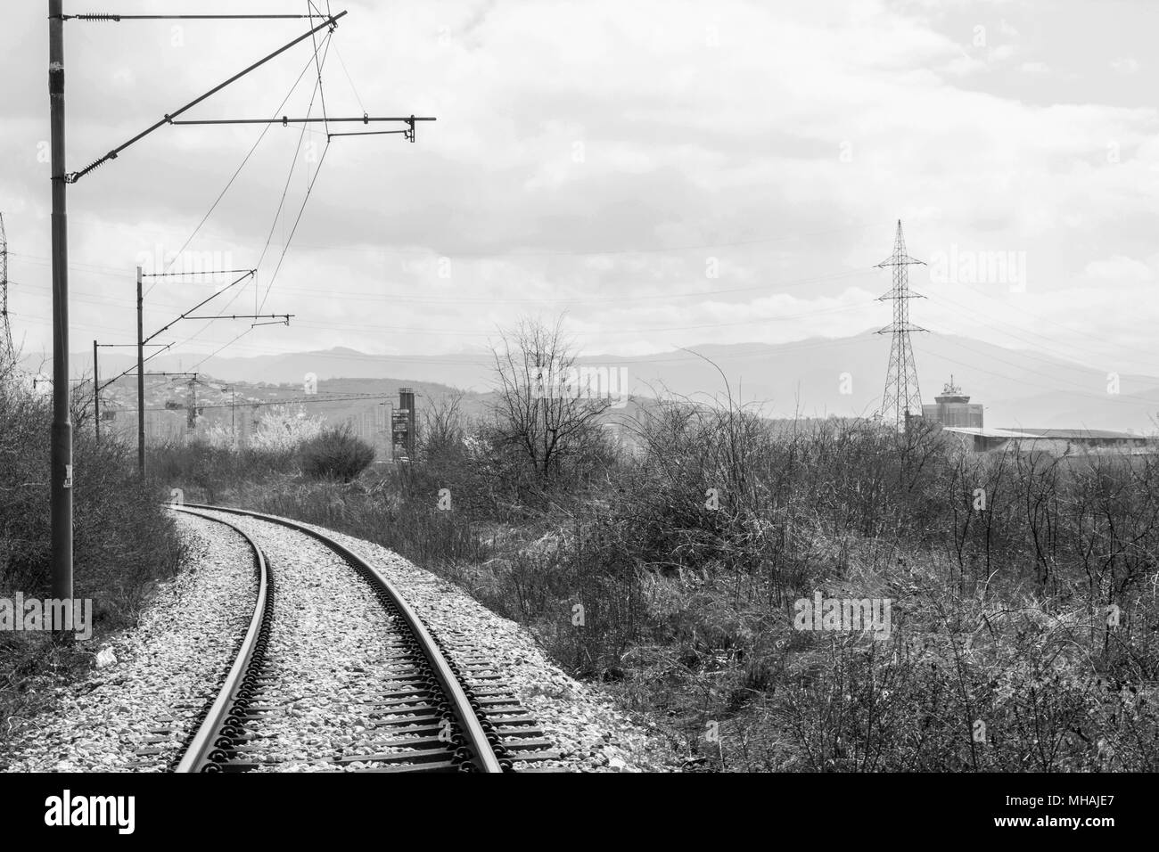 Photo of train rails in black and white Stock Photo - Alamy