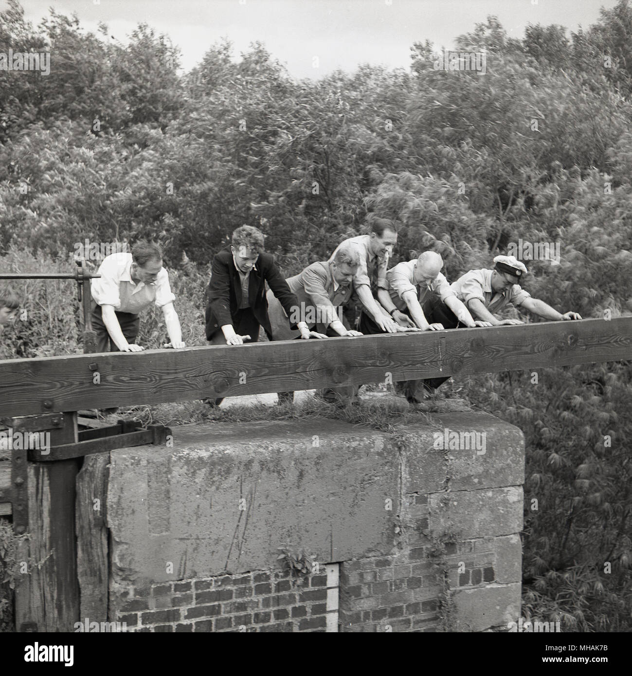 Men opening lock gate hi-res stock photography and images - Alamy