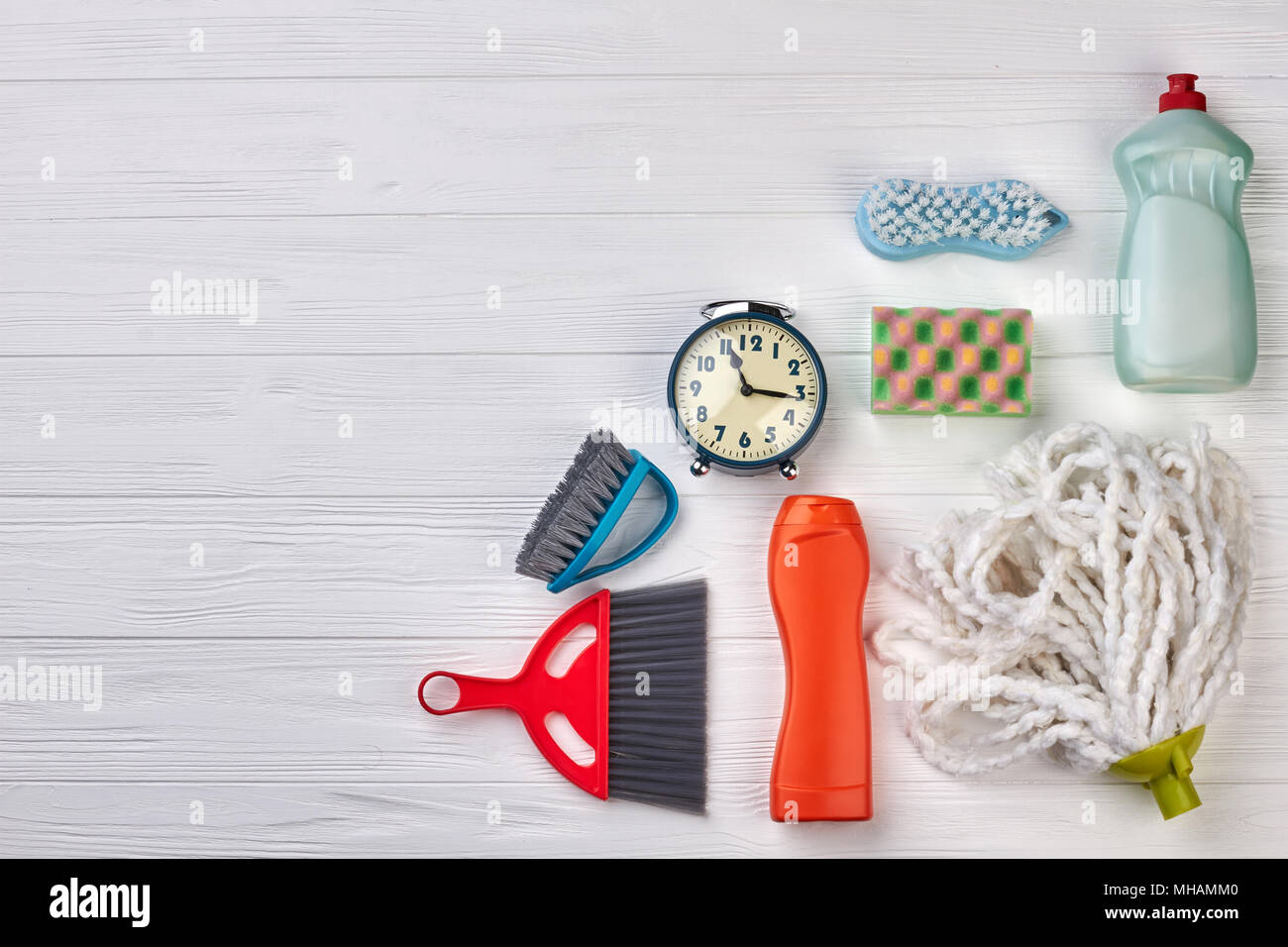 House cleaning equipment on wooden background Stock Photo - Alamy