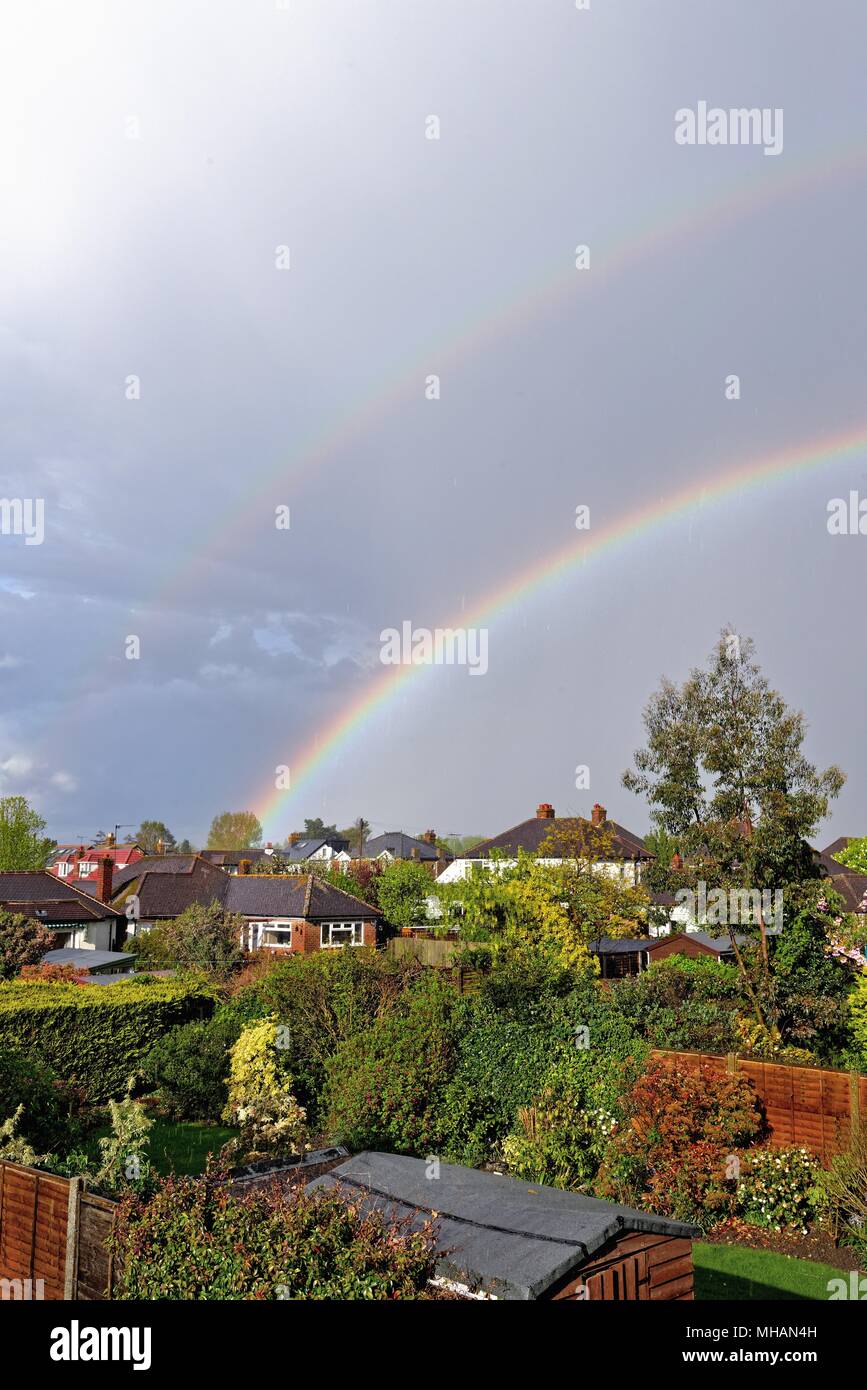 Rainbow over a landscape of bungalows in Shepperton Surrey England UK ...