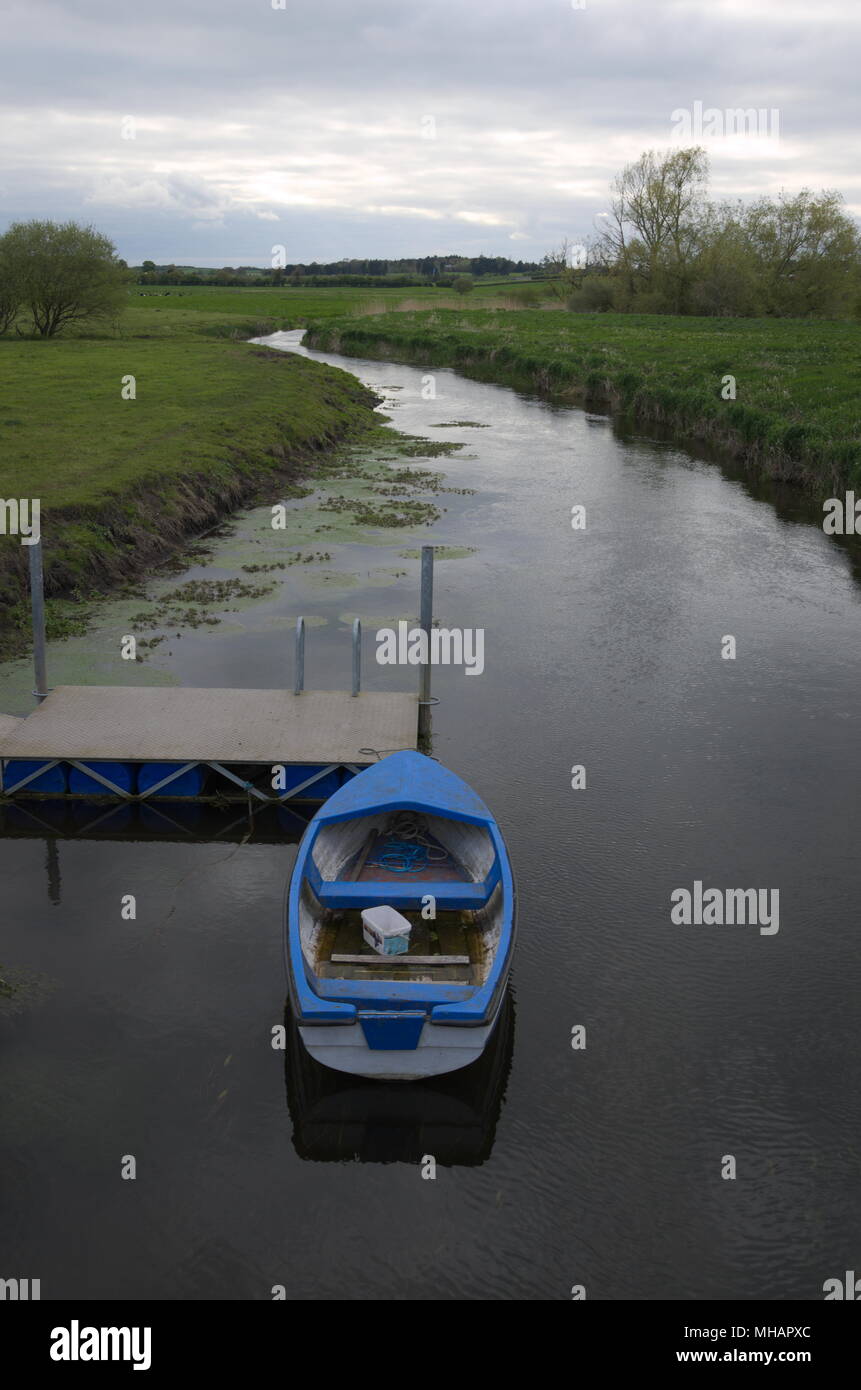 Boat on a river Stock Photo - Alamy