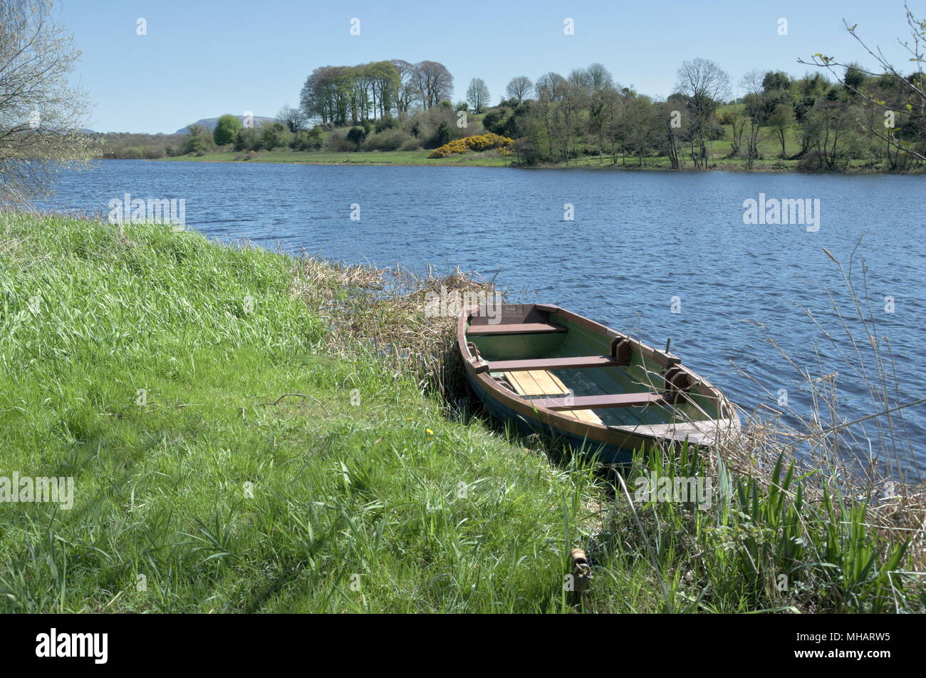 Boat on a river Stock Photo - Alamy
