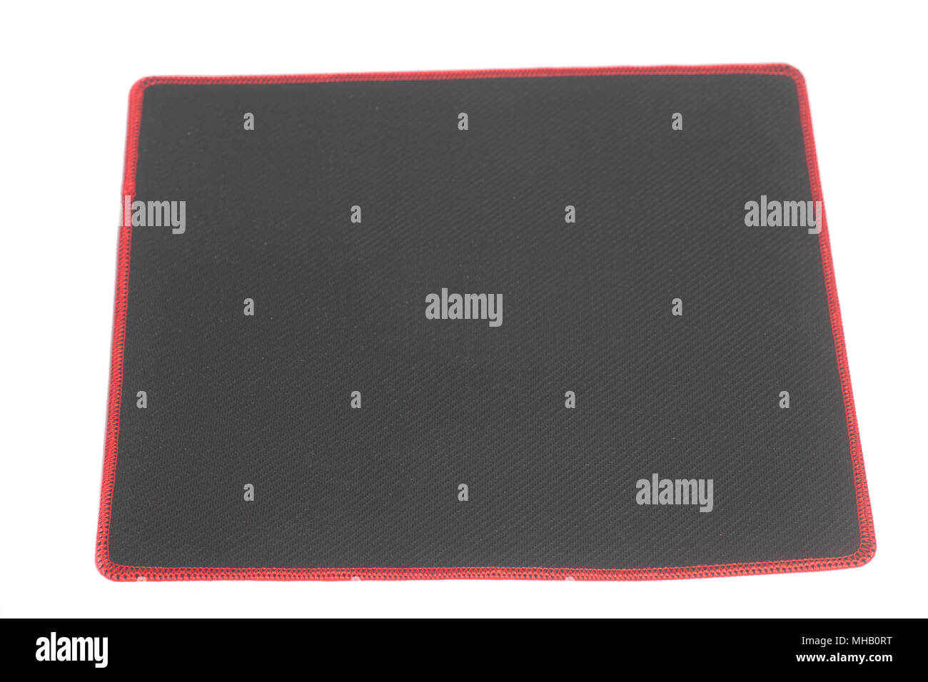 Black mouse pad isolated on white background Stock Photo - Alamy