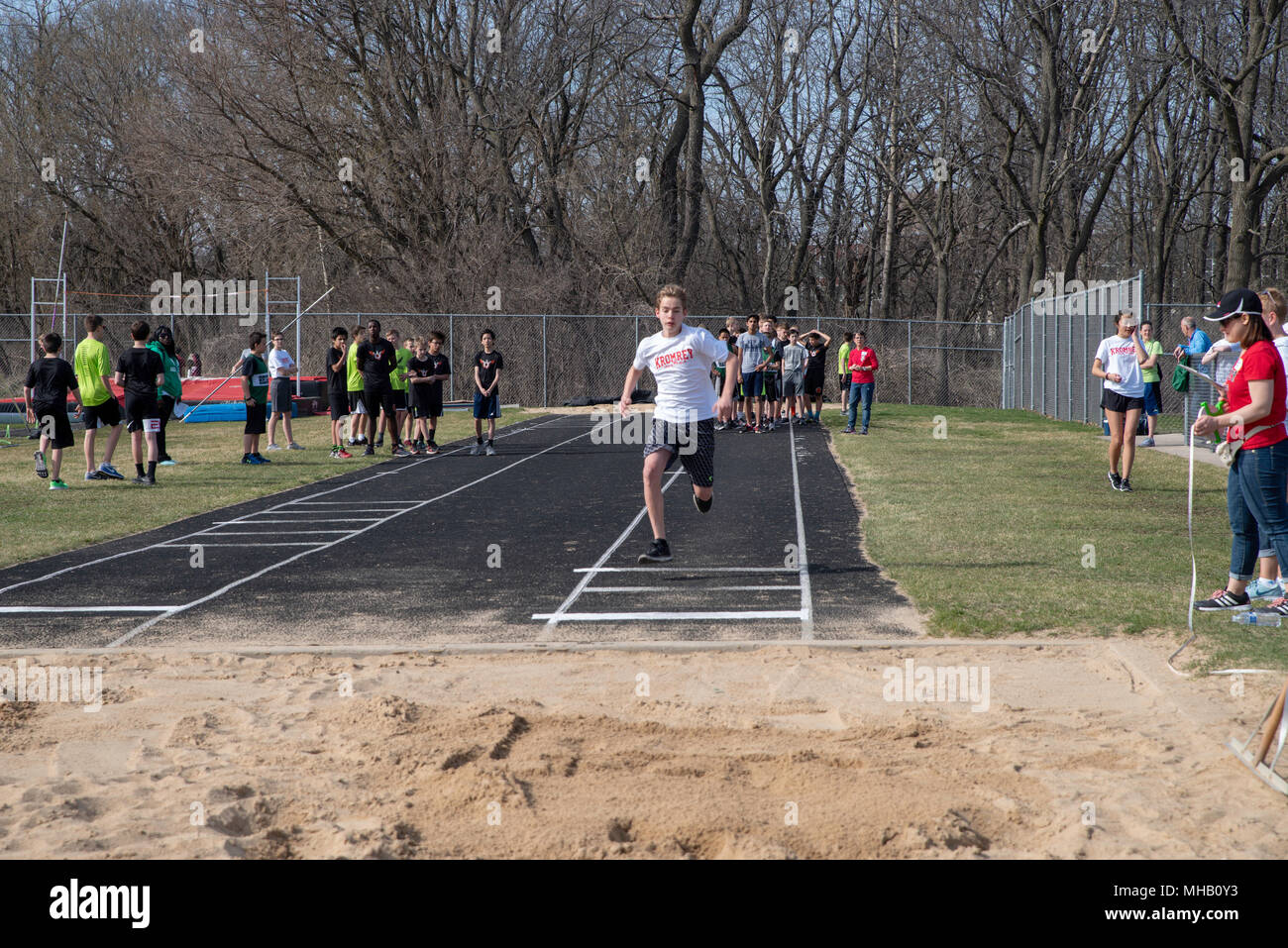 Middle school youth participate in a track and field meet at Middleton ...