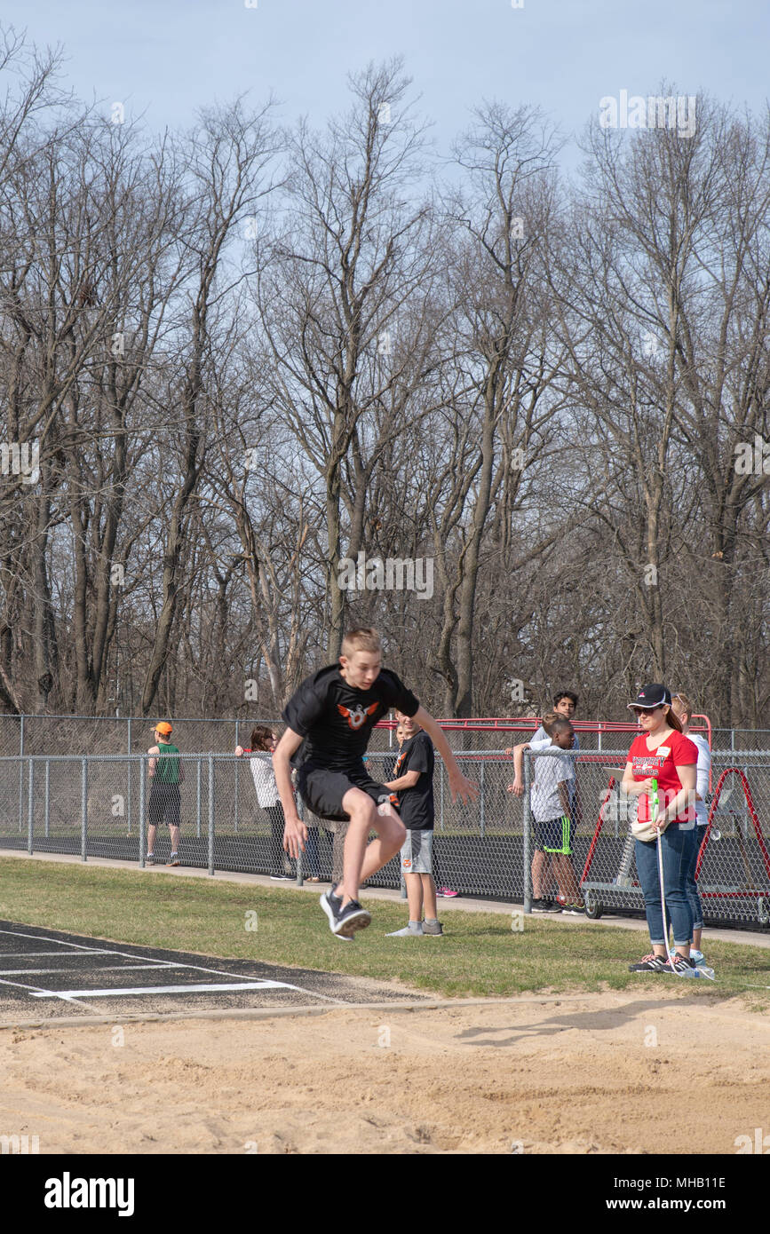 Middle school youth participate in a track and field meet at Middleton ...
