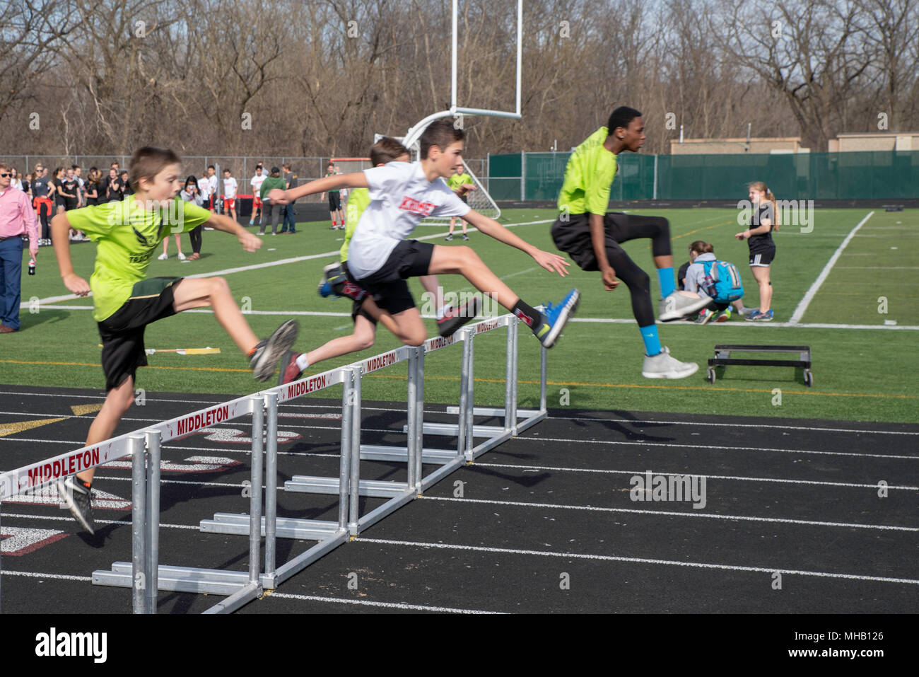 Middle school youth participate in a track and field meet at Middleton ...