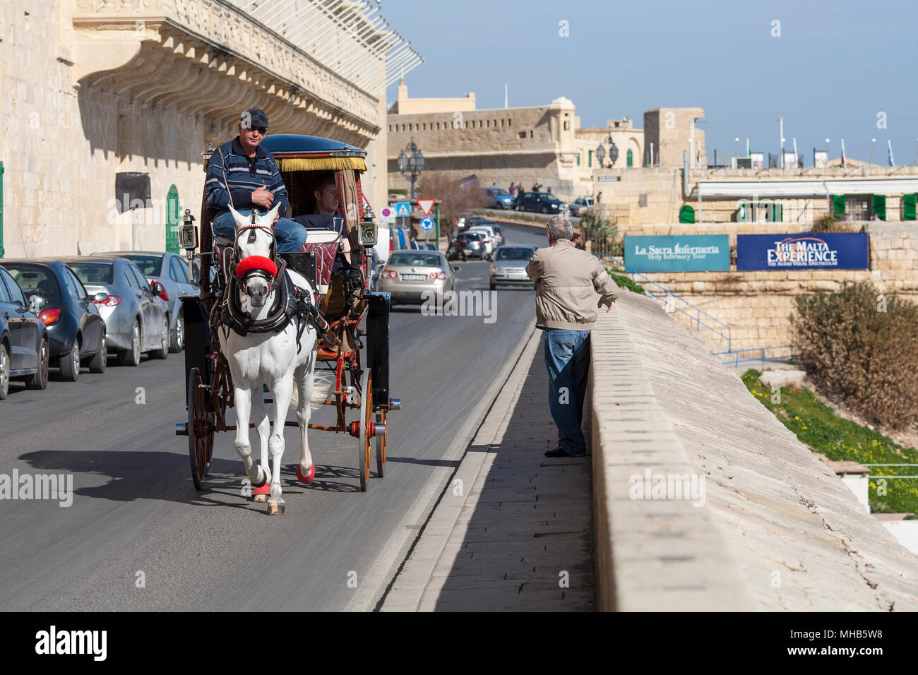 Horse drawn carriages offer visitors a guided tour of the sights in ...