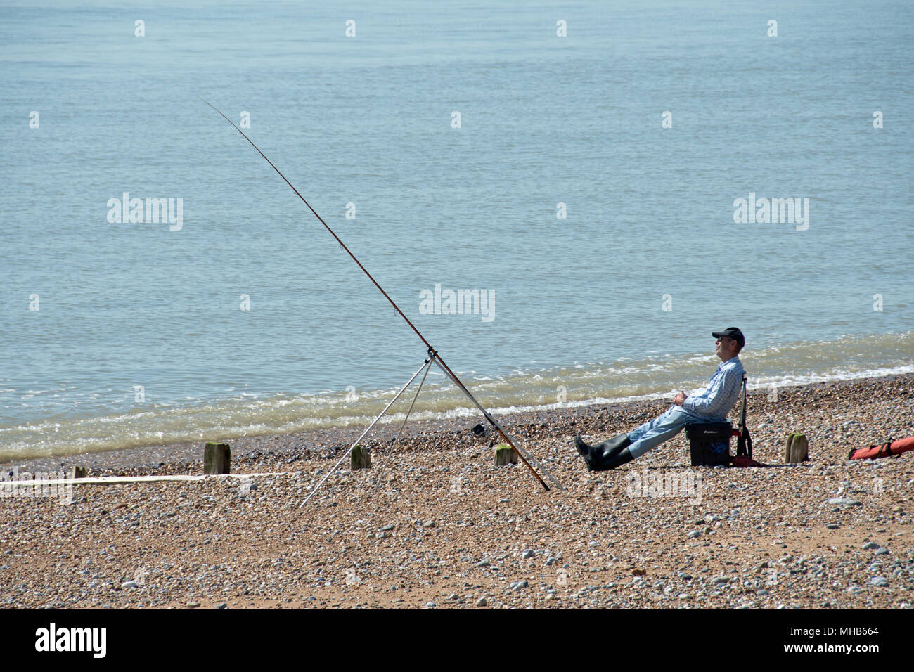 Sea-angling from the beach at Normans Bay, Sussex, UK Stock Photo - Alamy