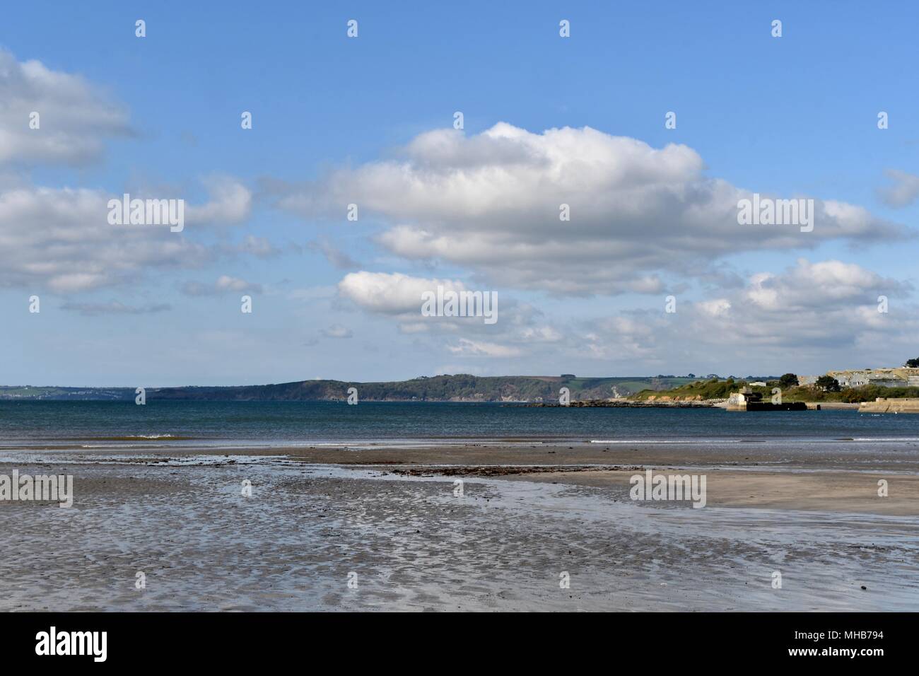 Clouds hovering over Par beach in Cornwall Stock Photo - Alamy