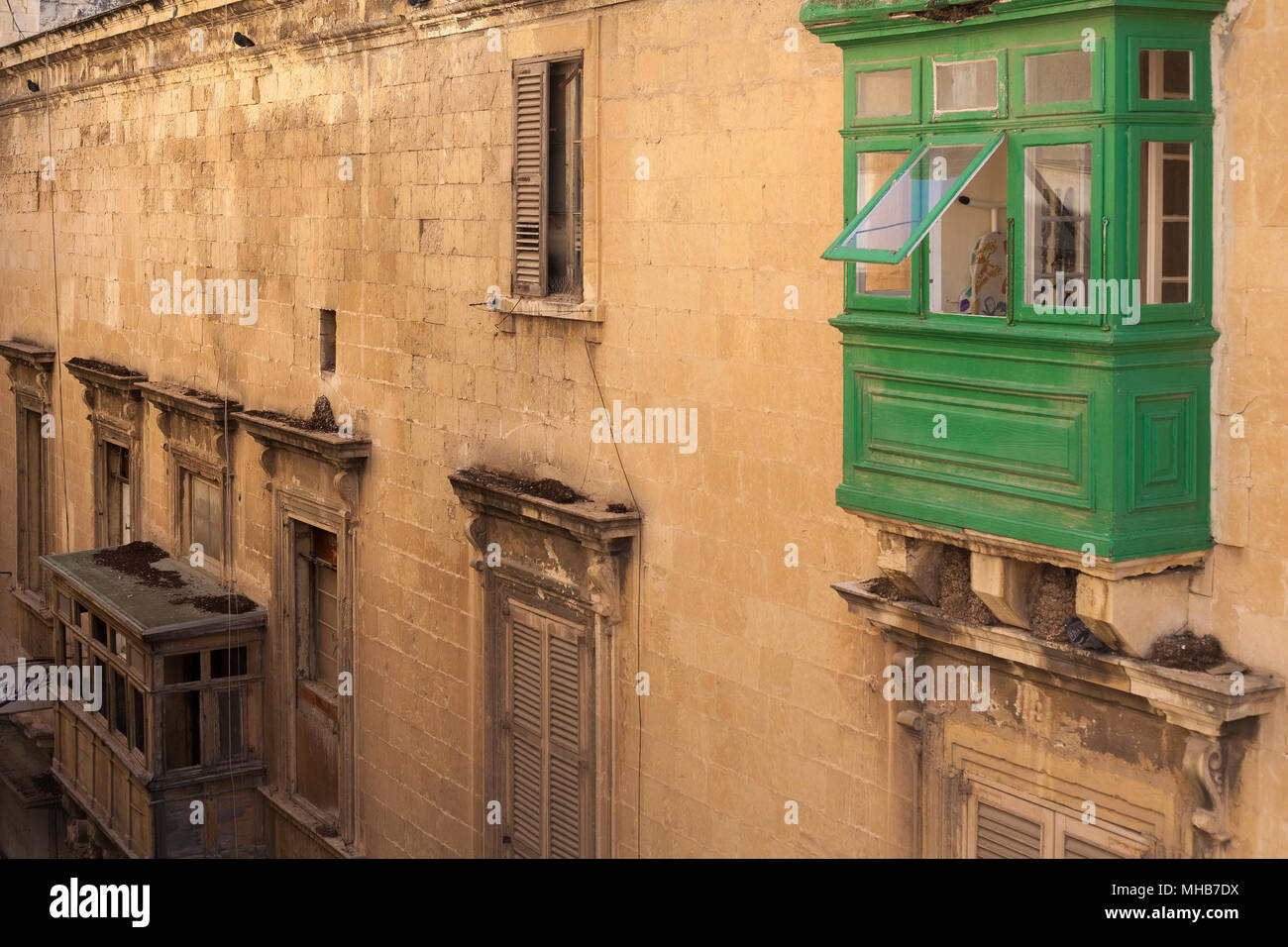 Valletta is well known for its iconic window boxes or Oriel windows ...