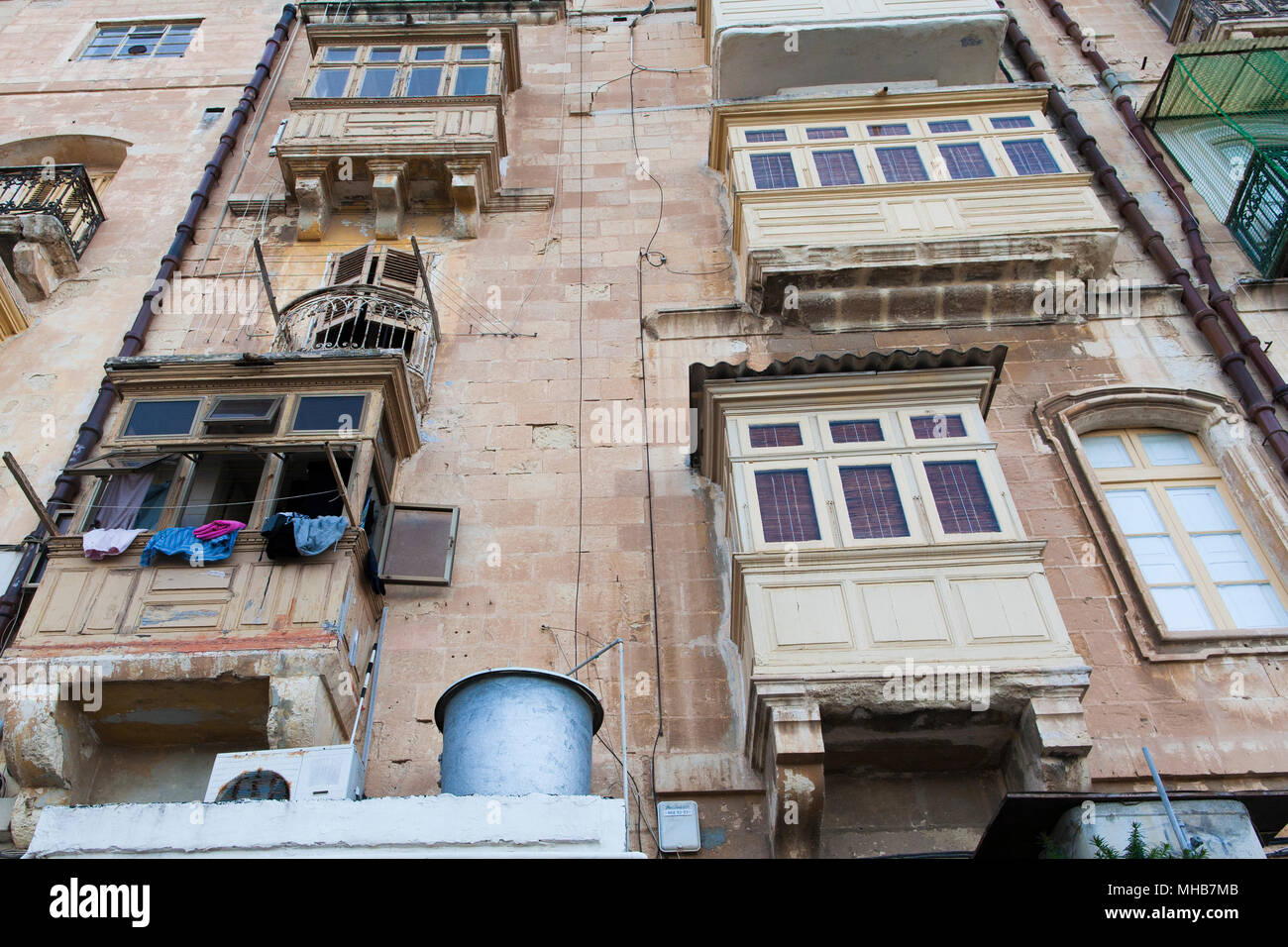 Valletta is well known for its iconic window boxes or Oriel windows ...