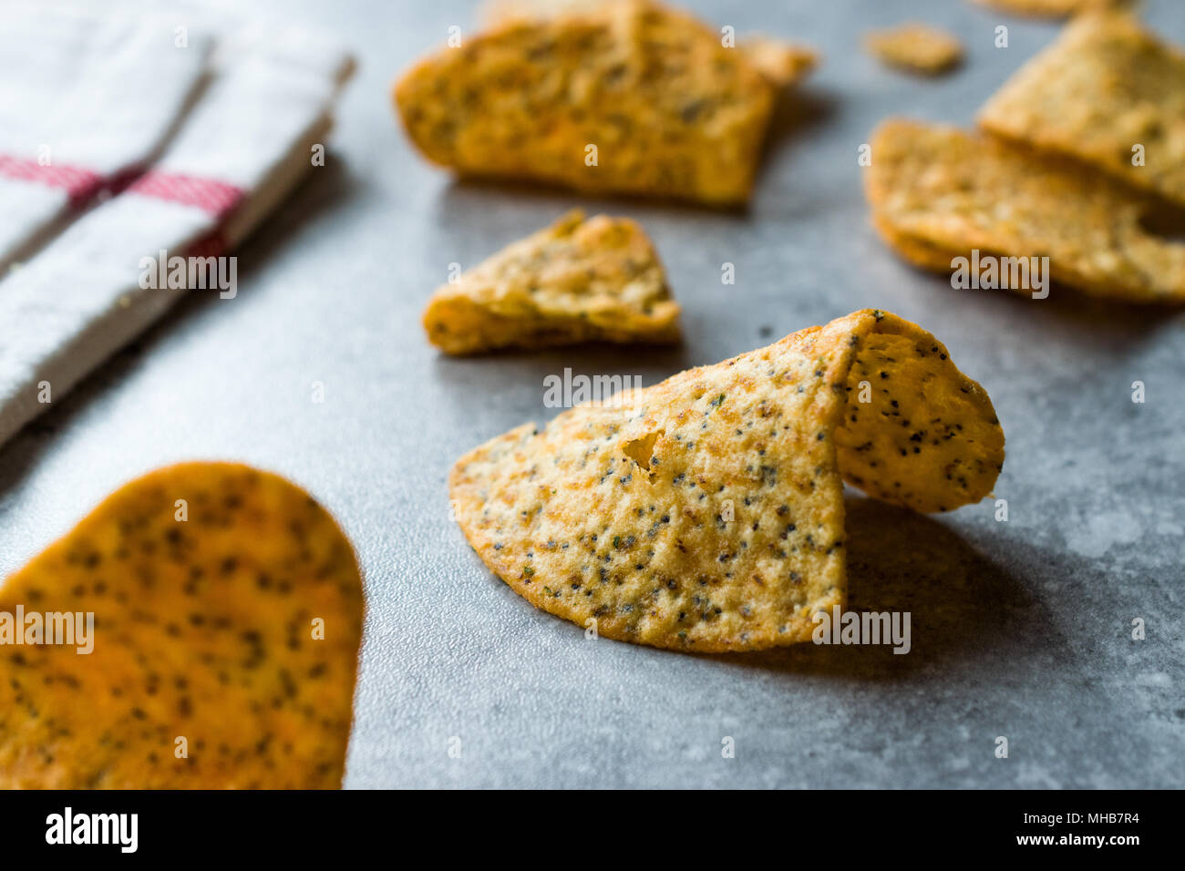 Triangle Corn Chips with Poppy Seeds. Turkish Snackers Stock Photo - Alamy