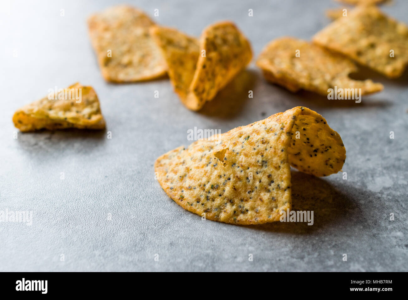 Triangle Corn Chips with Poppy Seeds. Turkish Snackers Stock Photo - Alamy