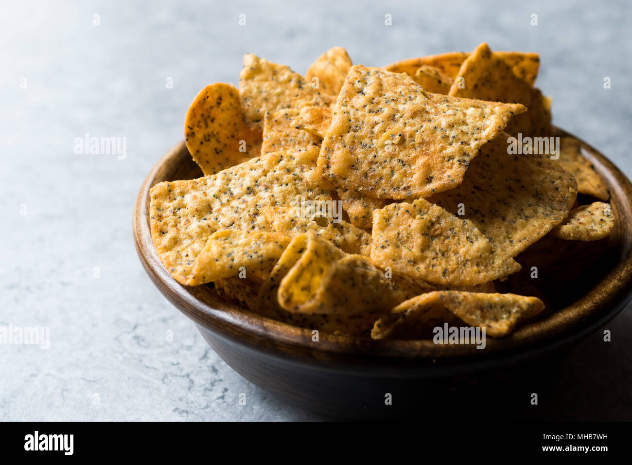 Triangle Corn Chips with Poppy Seeds. Turkish Snackers Stock Photo - Alamy