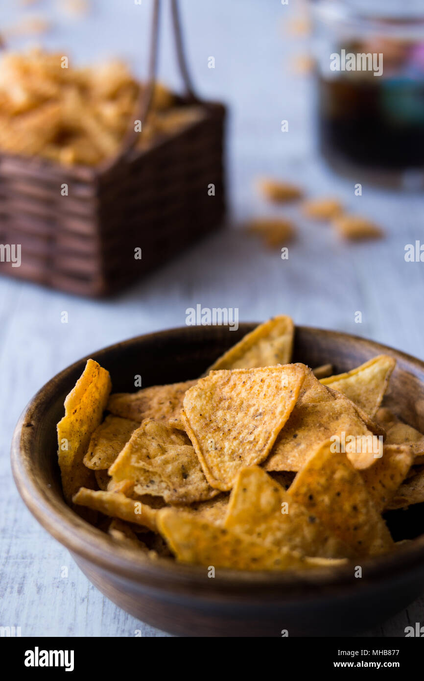 Chips (Snacks) and Beverage on a white wooden surface. (Party Style ...