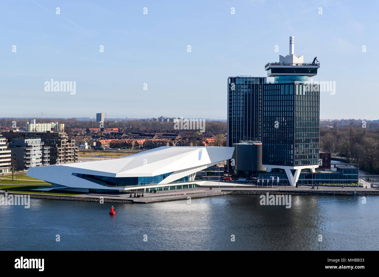 Aerial view of the EYE museum and the A'DAM Lookout tower, framed with ...