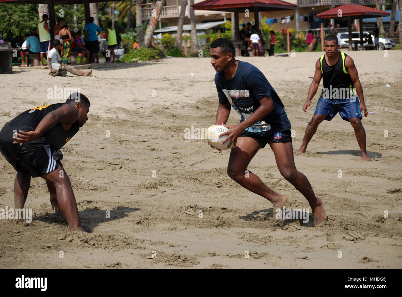 Fijian men playing rugby on Palm Beach, Pacific Harbour, Fiji Stock ...