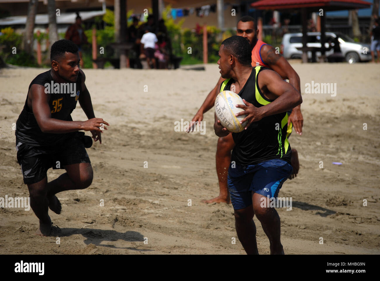 Fijian men playing rugby on Palm Beach, Pacific Harbour, Fiji Stock ...
