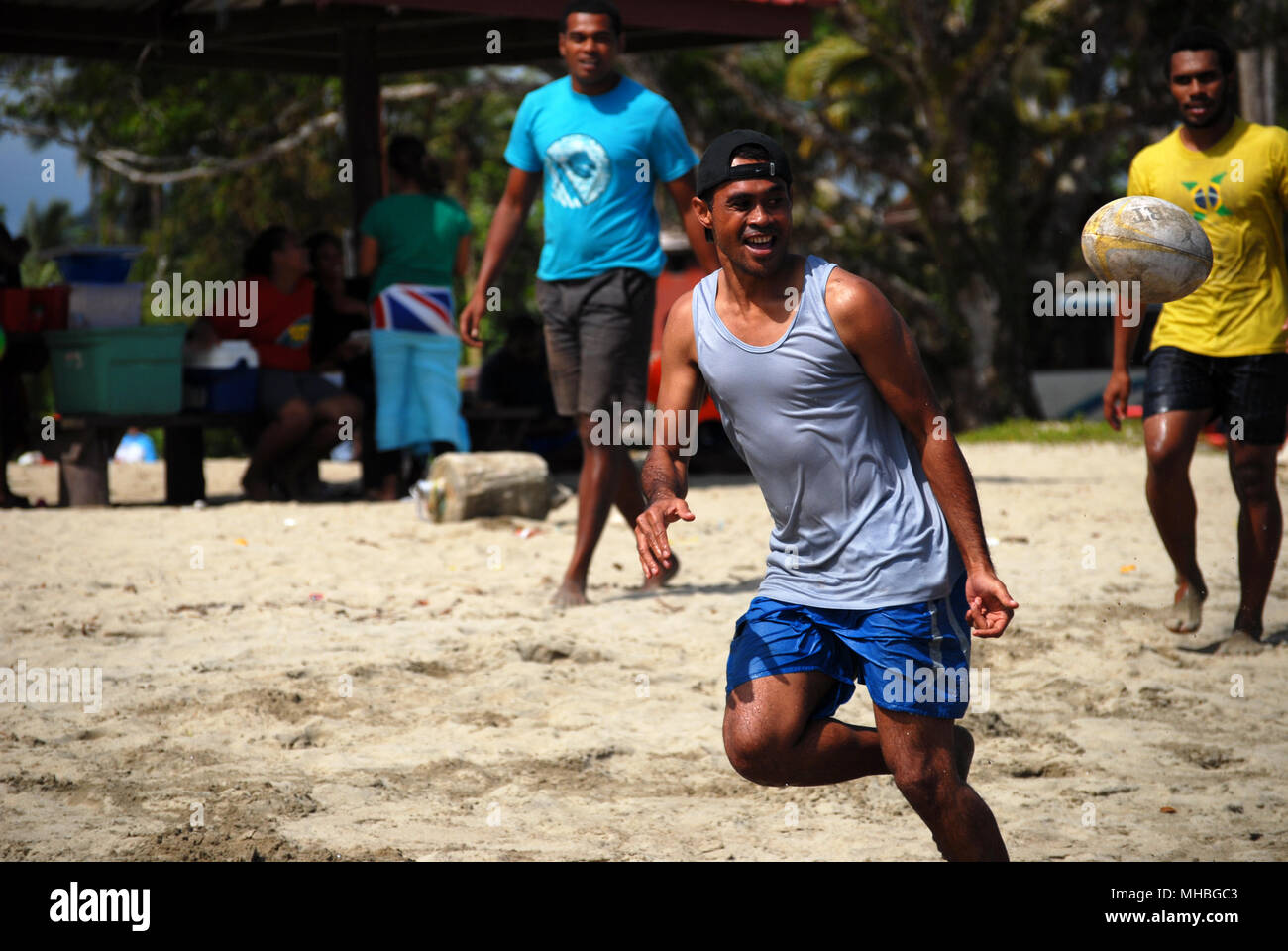 Fijian men playing rugby on Palm Beach, Pacific Harbour, Fiji Stock ...