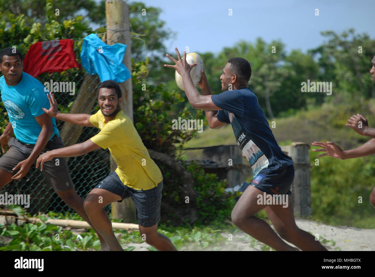 Fijian men playing rugby on Palm Beach, Pacific Harbour, Fiji Stock ...