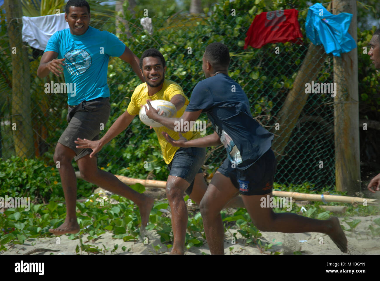 Fijian Men Playing Rugby On Beach High Resolution Stock Photography and ...