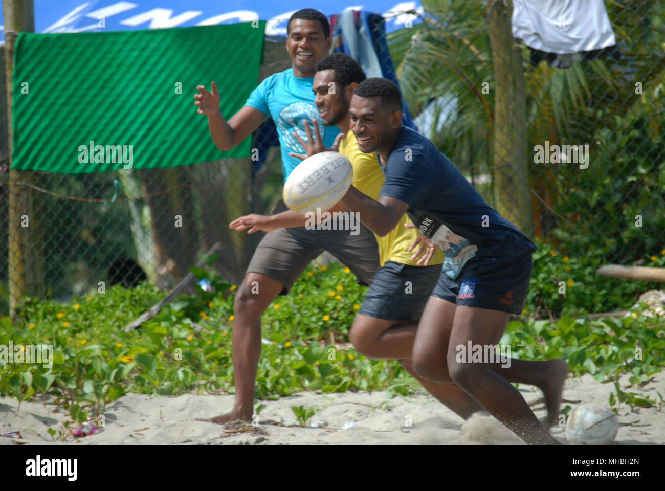 Fijian men playing rugby on Palm Beach, Pacific Harbour, Fiji Stock ...